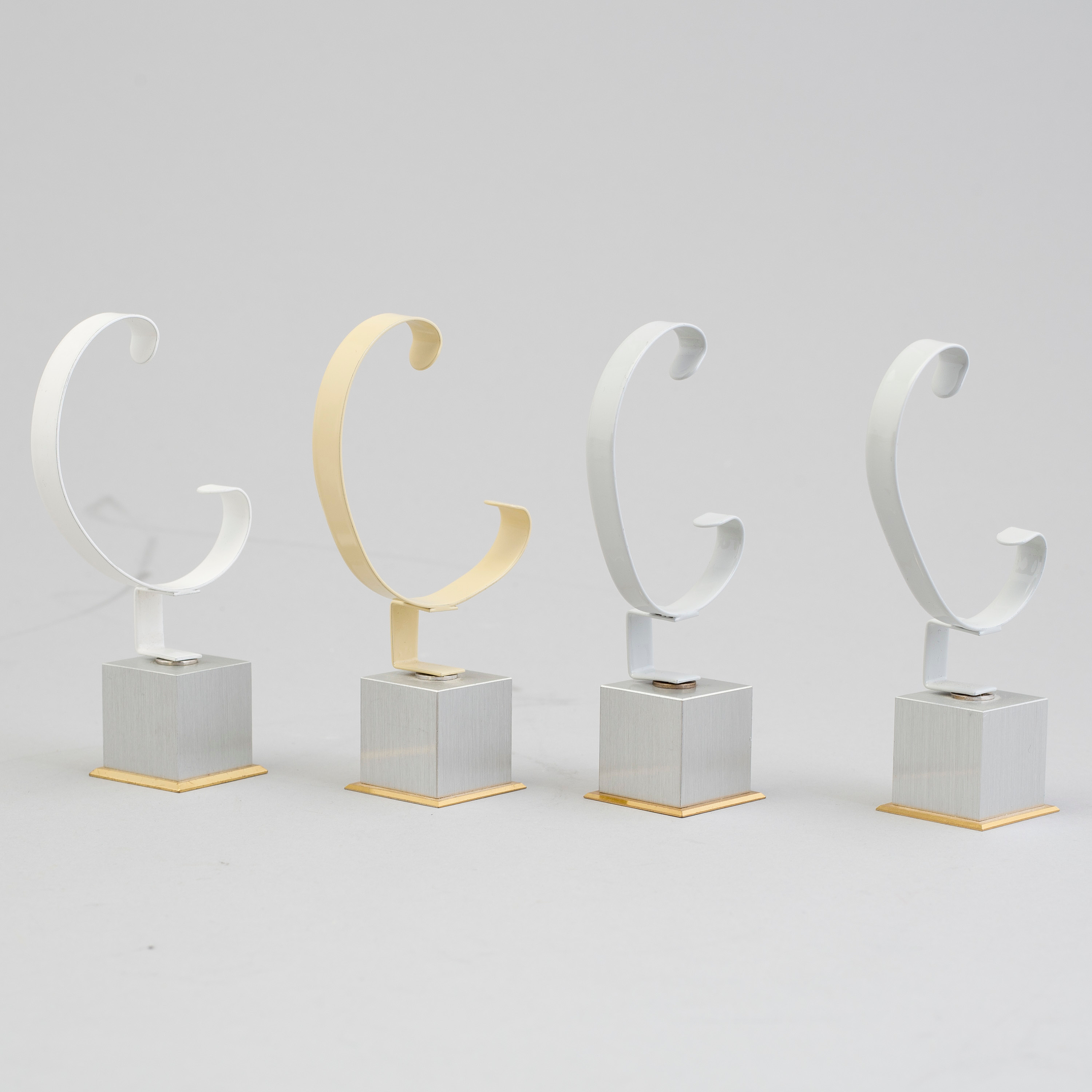 Rolex, Four watch display stands. - Bukowskis