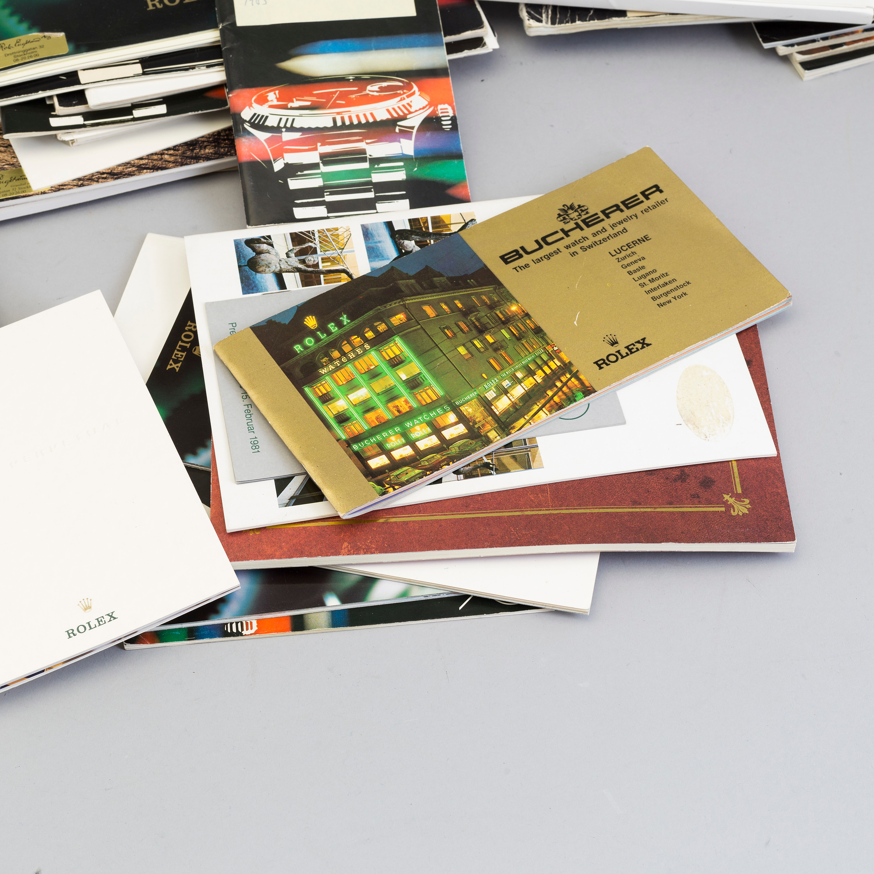 ROLEX, booklets / catalogues, c. 35 pcs, 1970-1990-tal. - Bukowskis