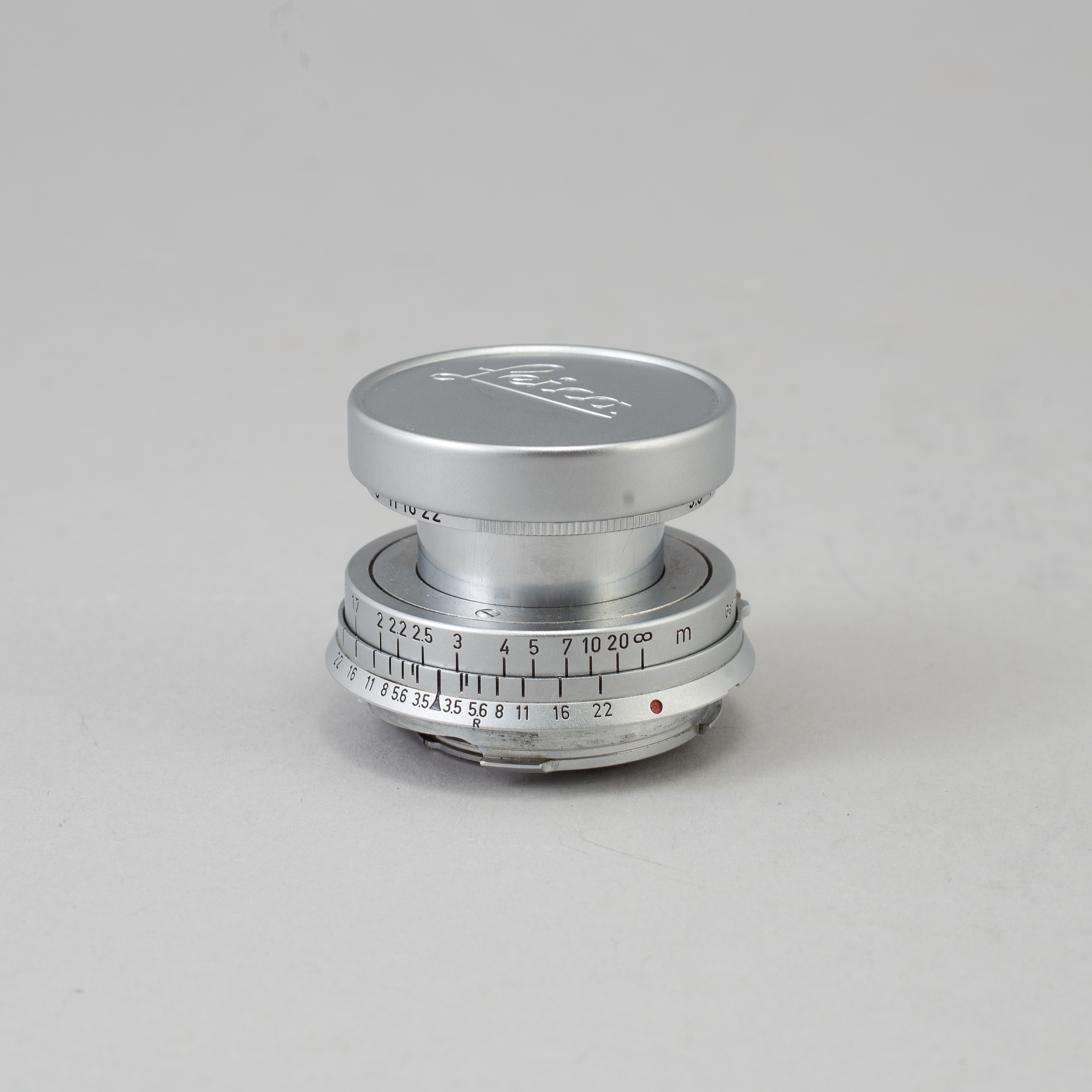 A chrome Leica Elmar f=5 cm 1:3,5 lens no 1184256. Designed by Max ...