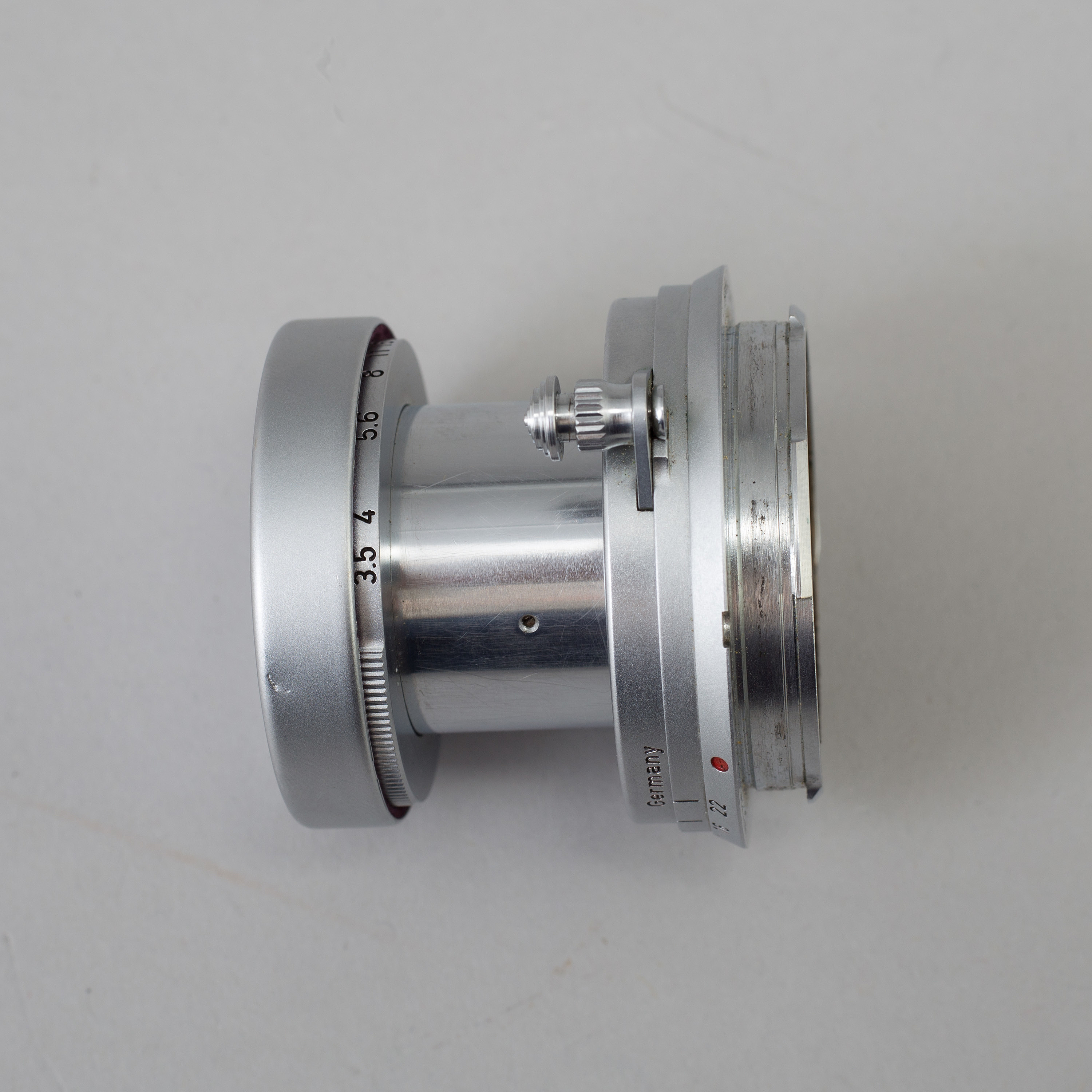 A chrome Leica Elmar f=5 cm 1:3,5 lens no 1184256. Designed by Max ...