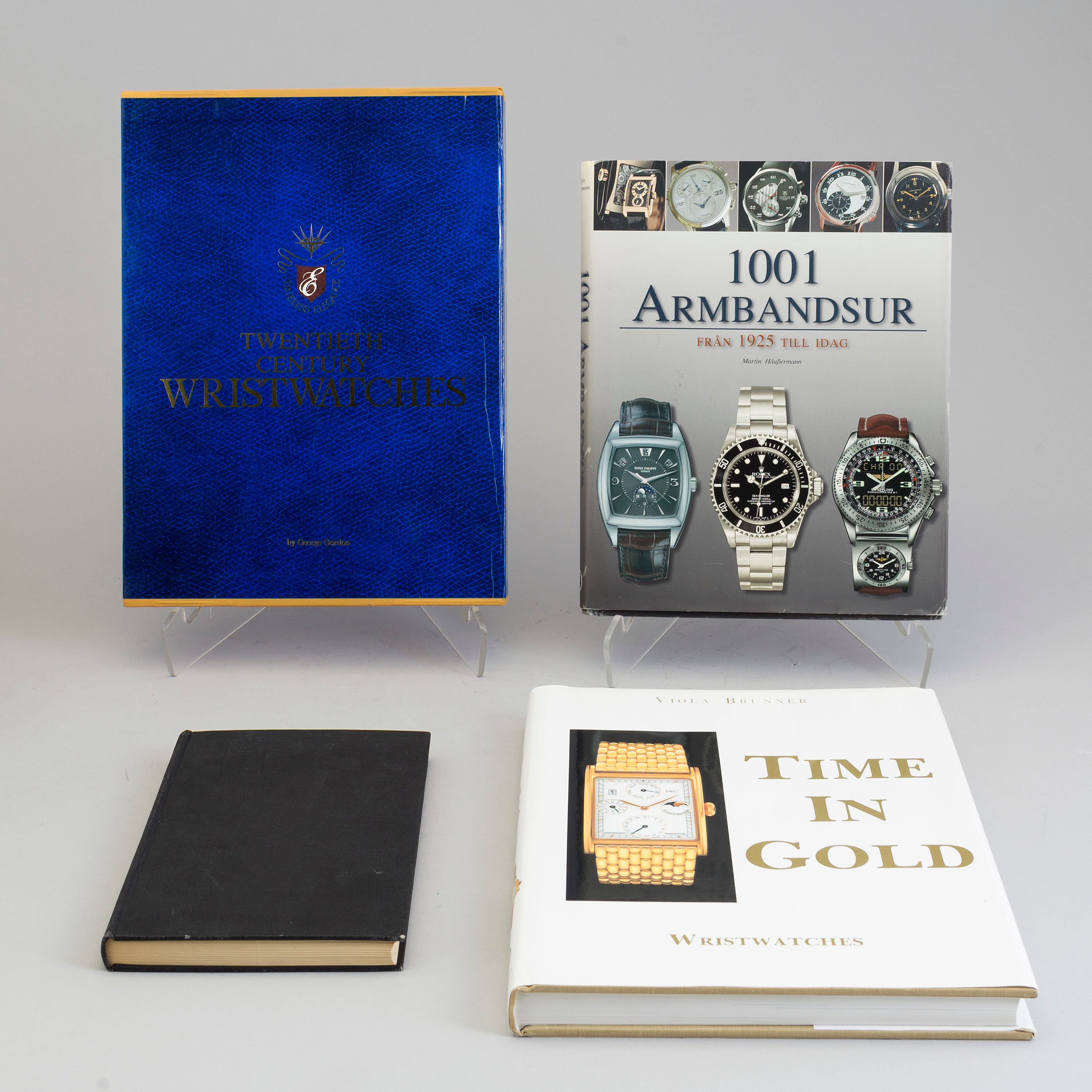 A set of 4 watch books. - Bukowskis
