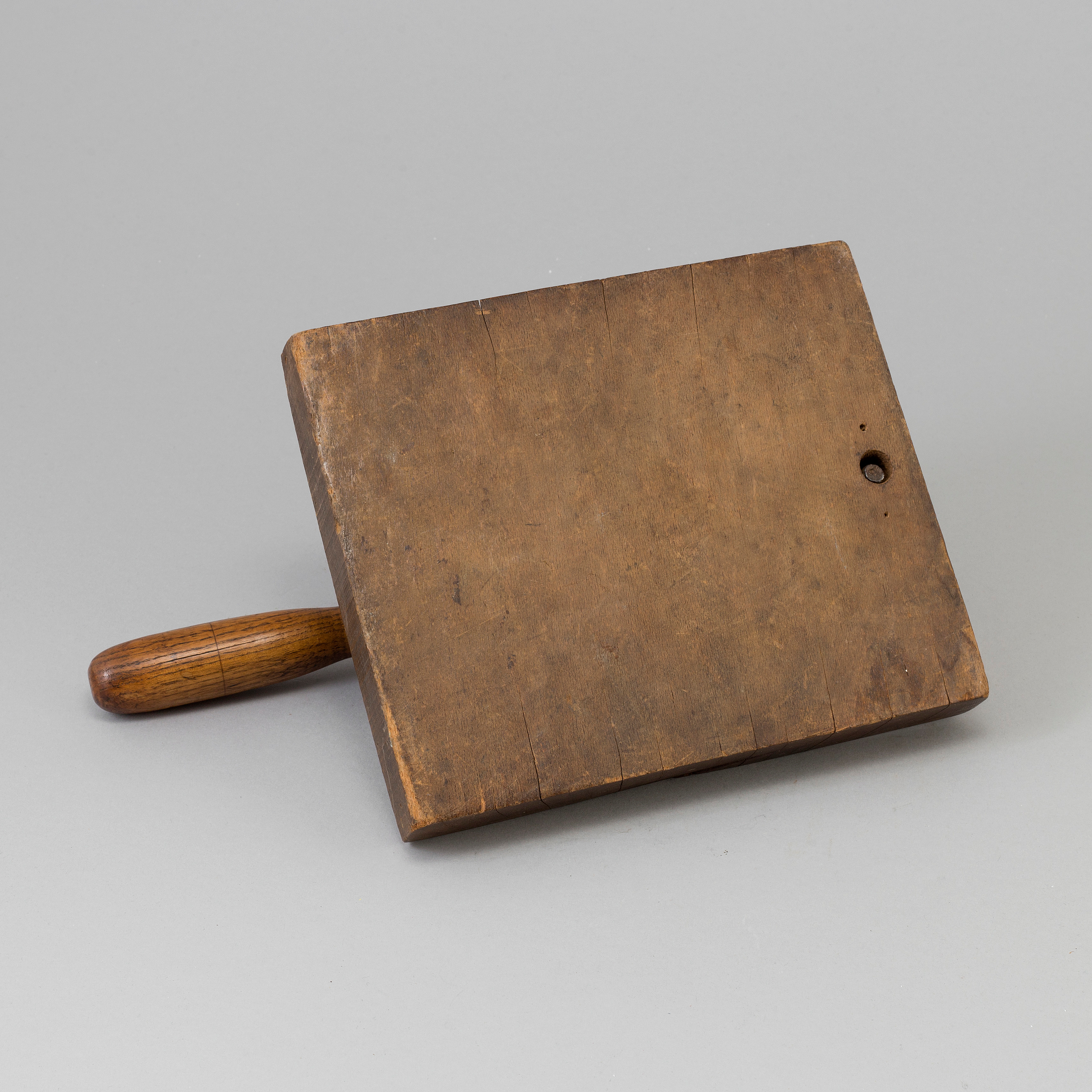 A 19TH CENTURY TOBACCO CUTTER, wood and iron. - Bukowskis