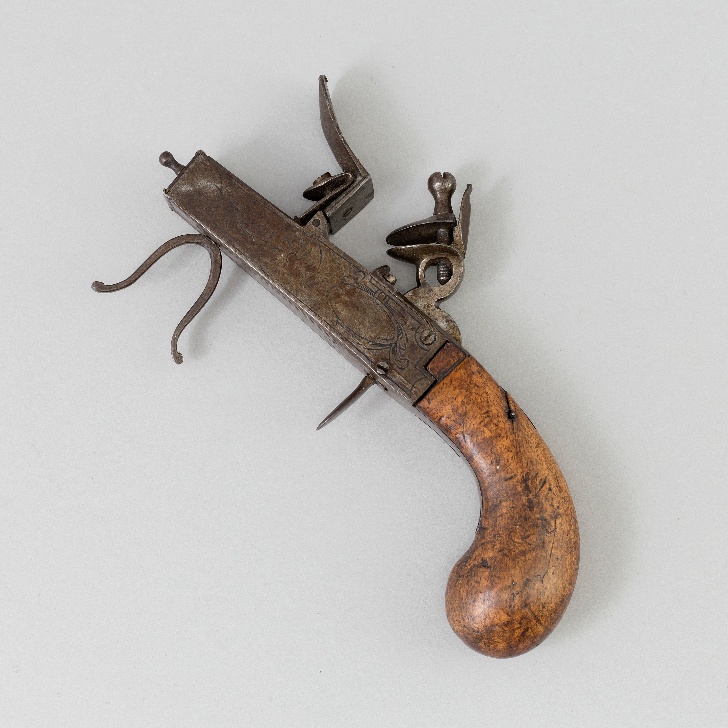 A FLINTLOCK LIGHTER, iron, 18th century. - Bukowskis
