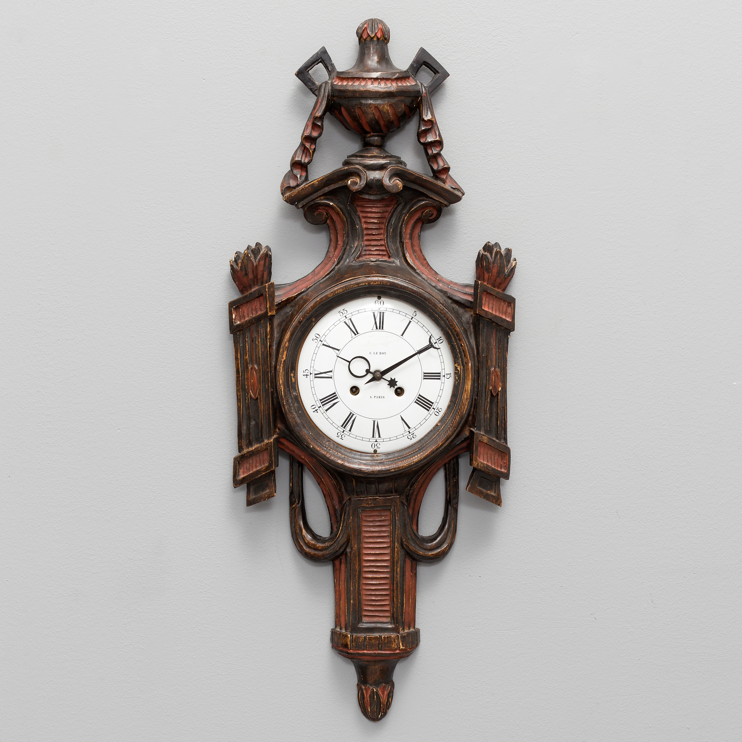 A CARVED WOOD WALL CLOCK, 19th century. - Bukowskis