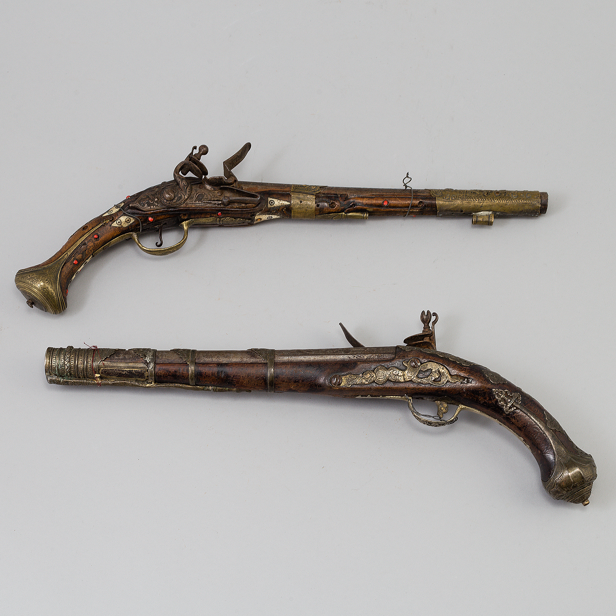 Two 19th century flintlock pistols. - Bukowskis