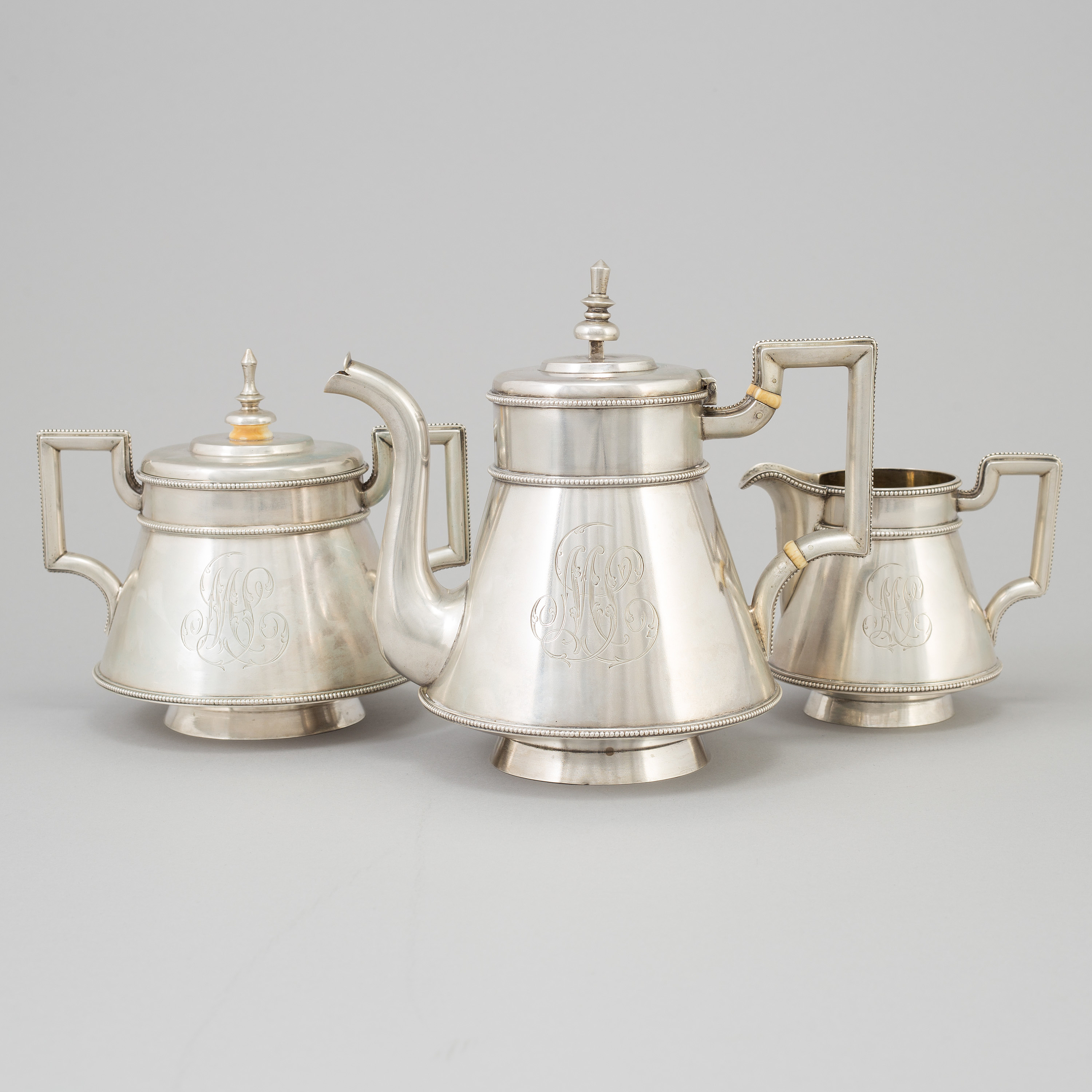 A Russian 19th century parcel-gilt silver coffee set, 3 pices ...
