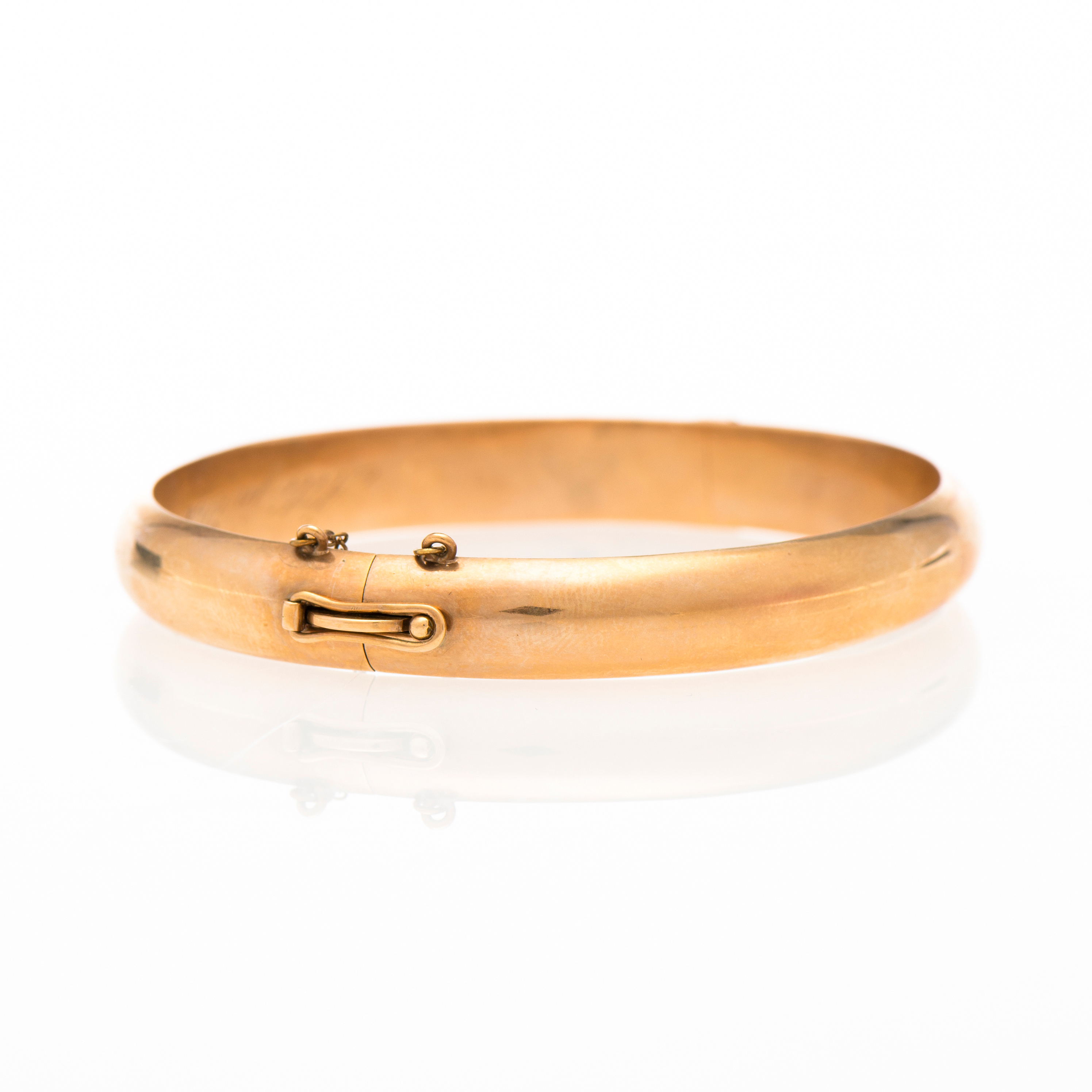 ARMRING, 14K guld. Helsingfors 1964. - Bukowskis