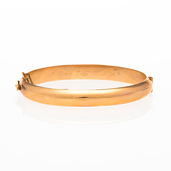 ARMRING, 14K guld. Helsingfors 1964. - Bukowskis