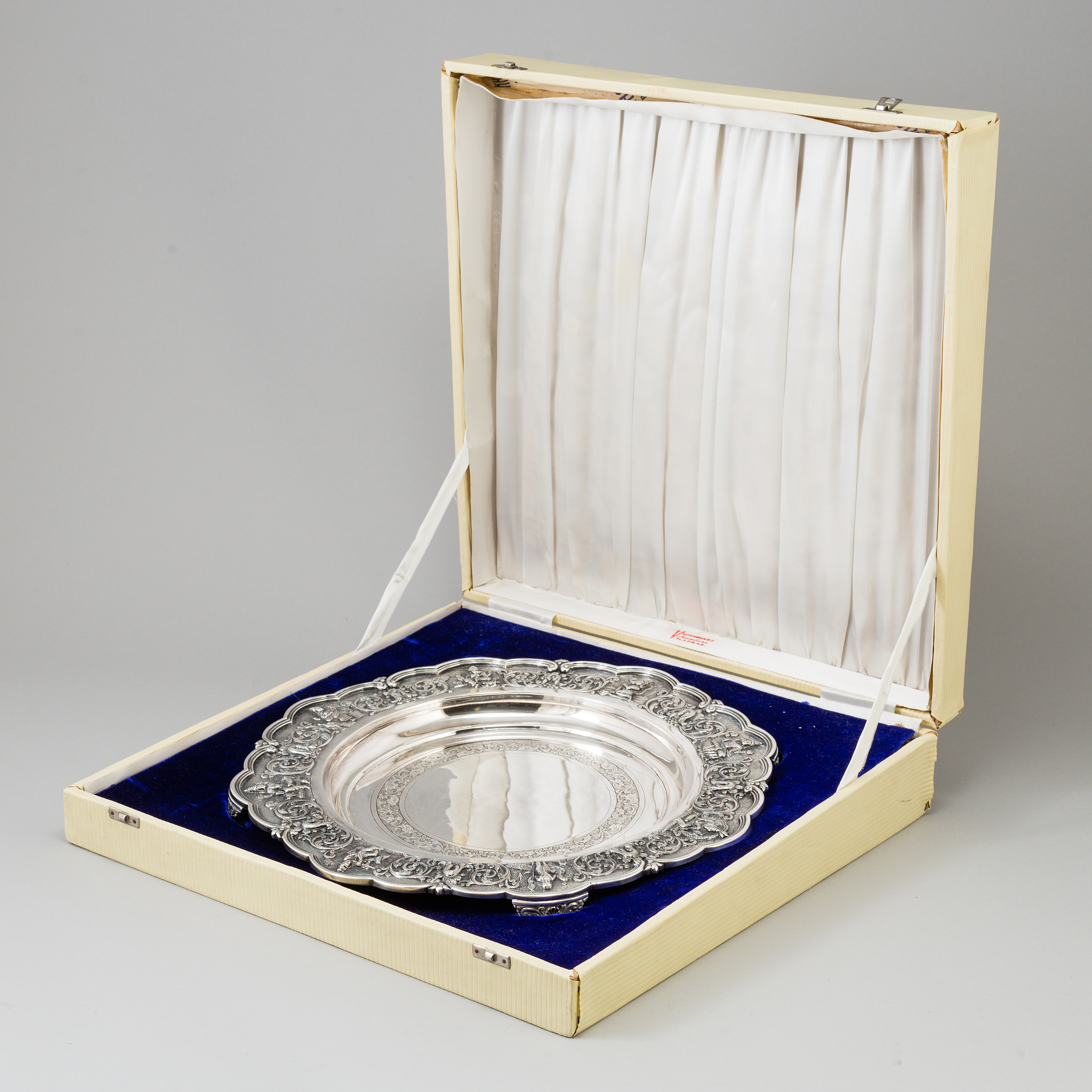 A sterling silver plate, India, mid 20th century. Weight ca 1 513 grams ...