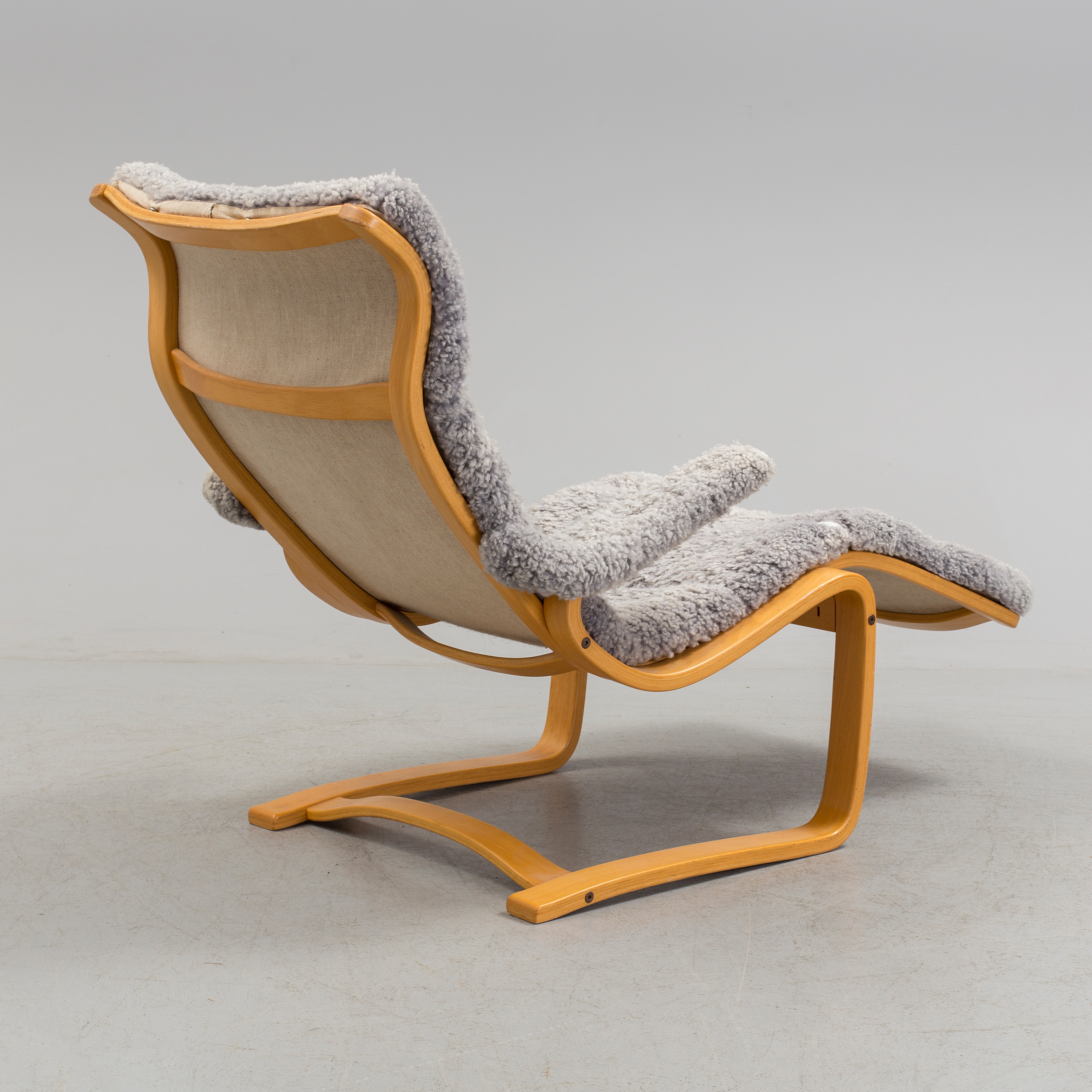 A 'Marianne' easy chair by Gustaf Axel Berg, Bröderna Andersson ...