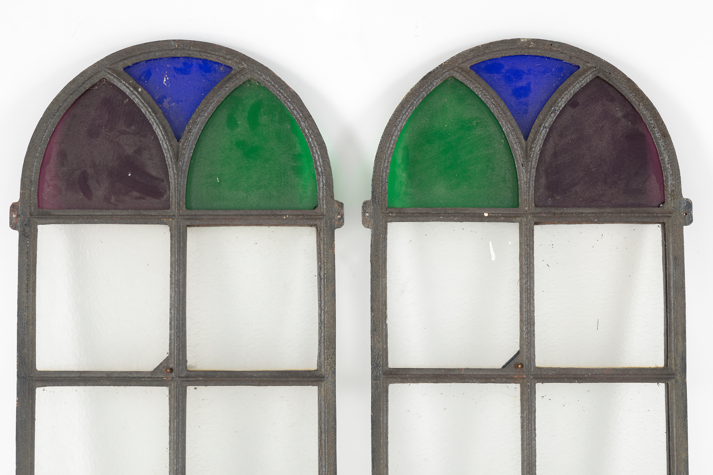 A pair of cast iron and glass windows, first half of the 20th century ...