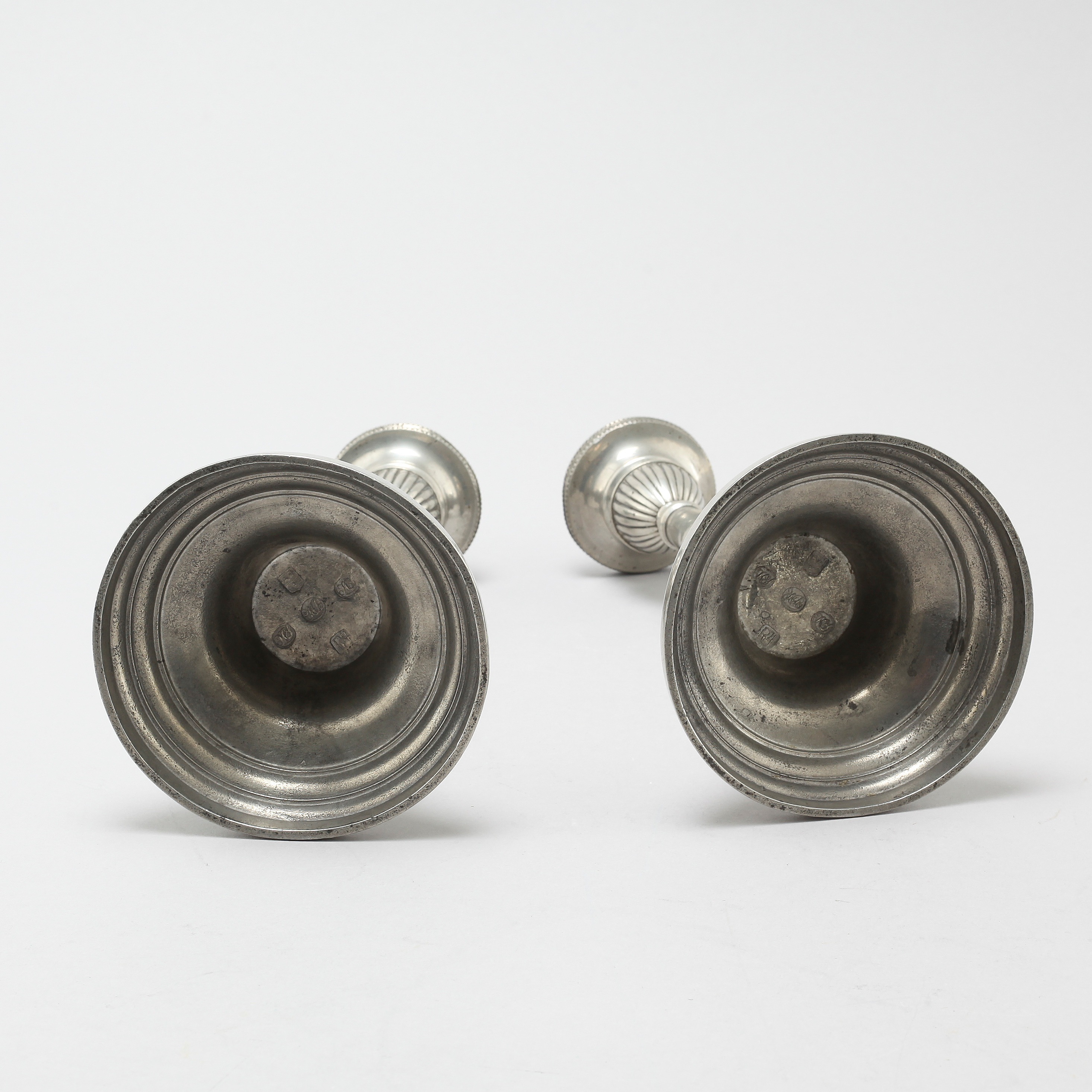 A pair of pewter candlesticks by Henrik Philip Stickler from ...