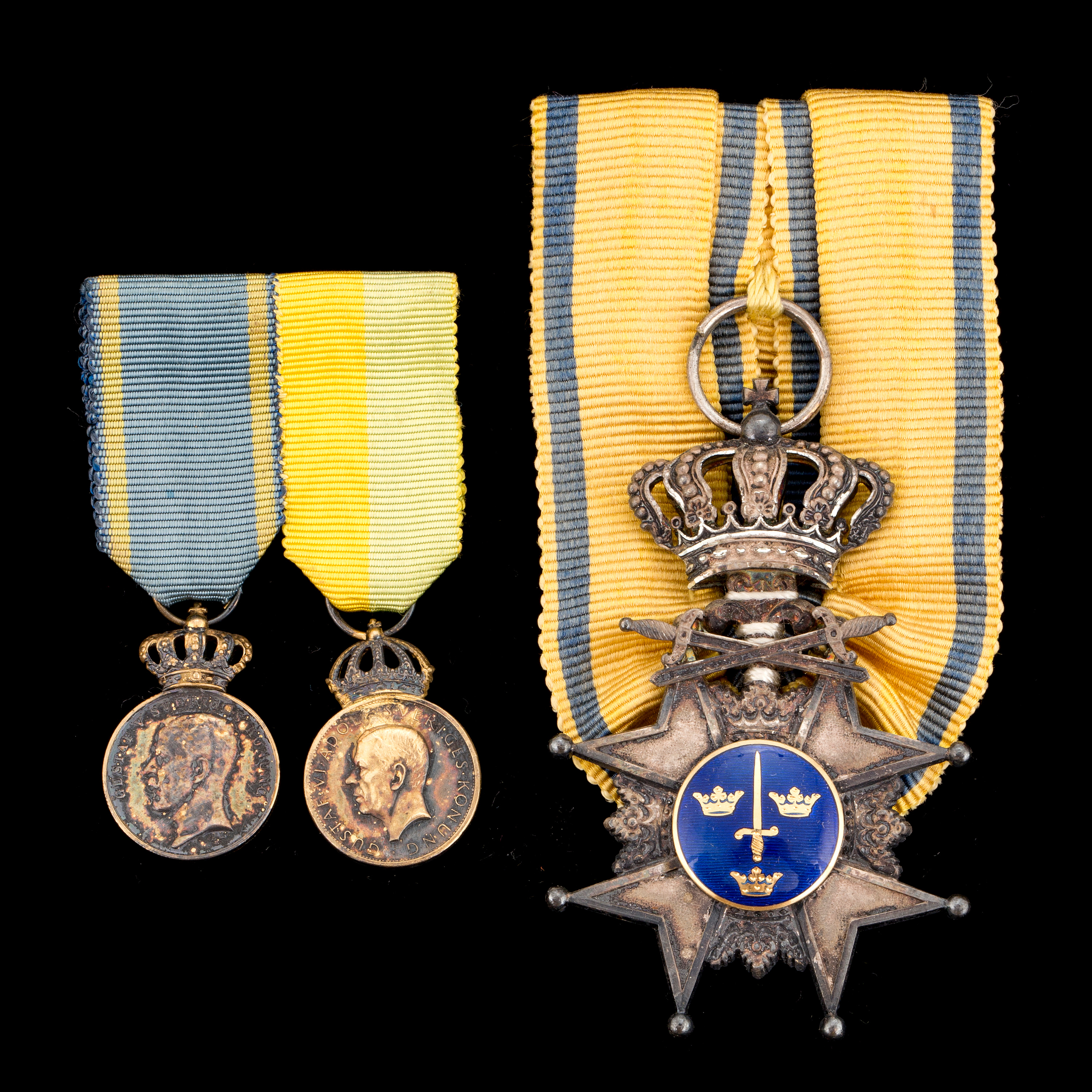 A Swedish ("Badge of the Sword") medal state decoration and two ...