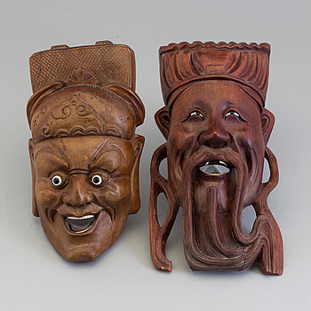 Two wooden south east asian masks, 20th century. - Bukowskis
