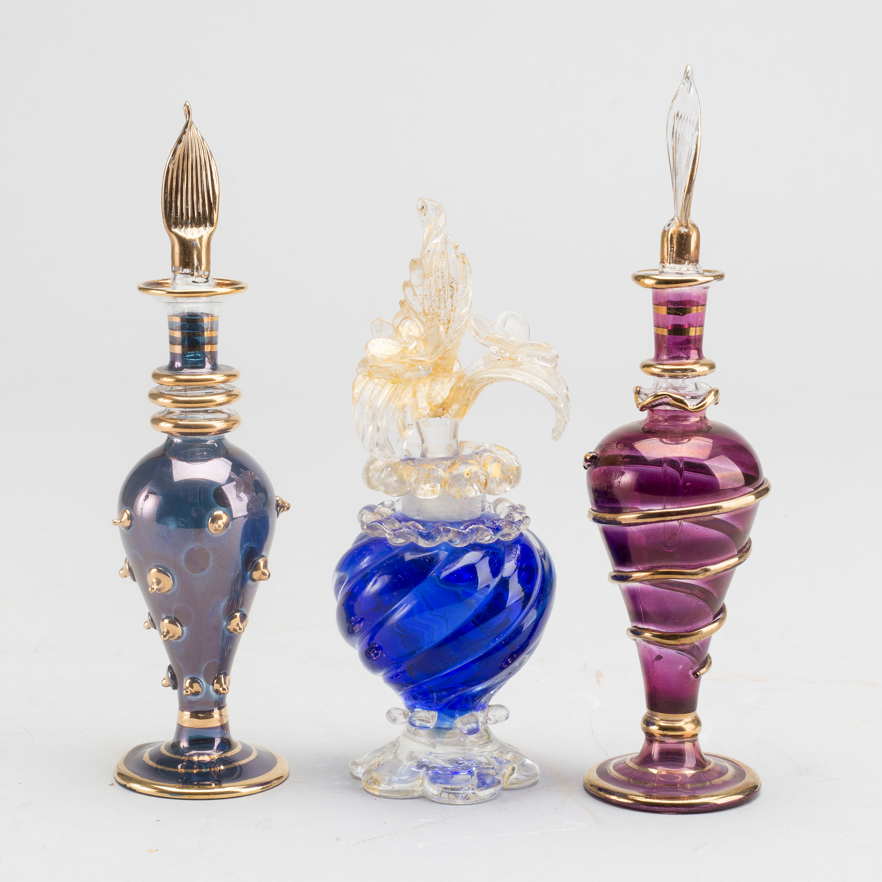 A set of three perfume bottles mid 1900's. - Bukowskis