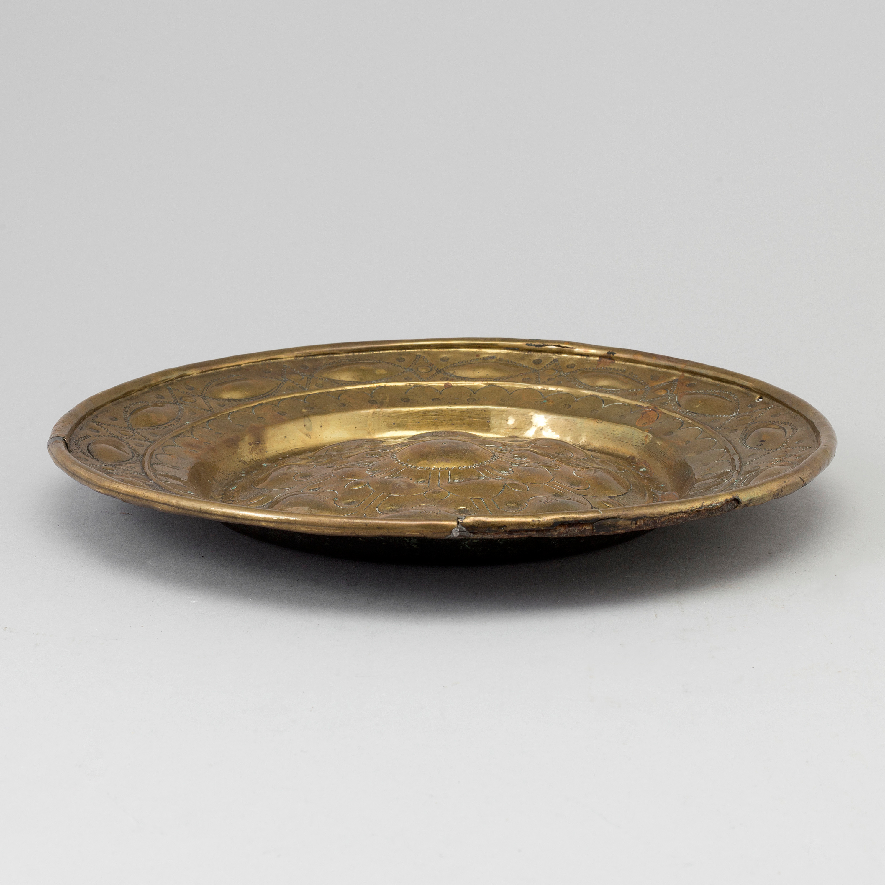 A Baroque brass repousse alms plate, Northern Europe 17th century ...