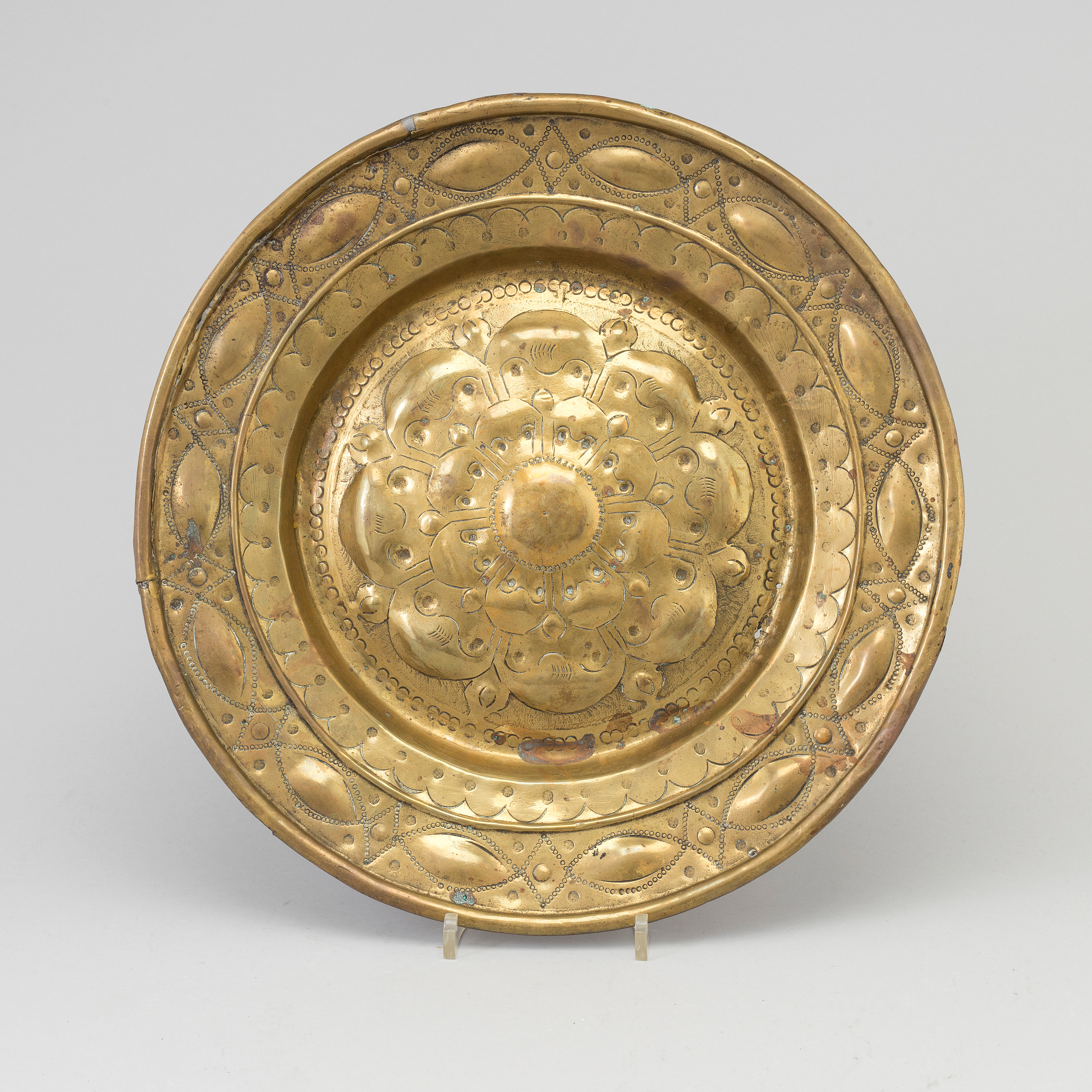 A Baroque brass repousse alms plate, Northern Europe 17th century ...