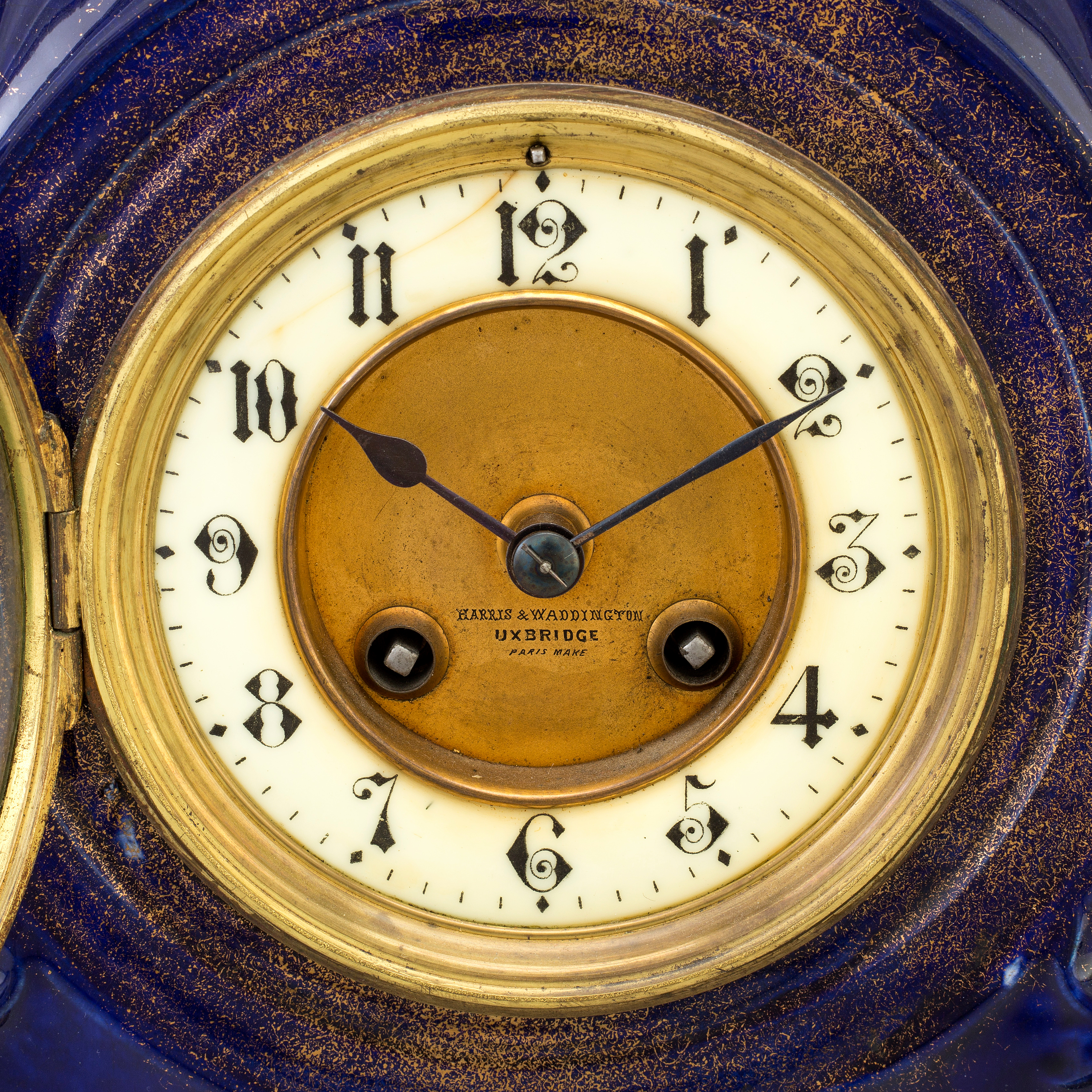 A creamware mantle clock from Harris & Waddington, Uxbridge, England ...